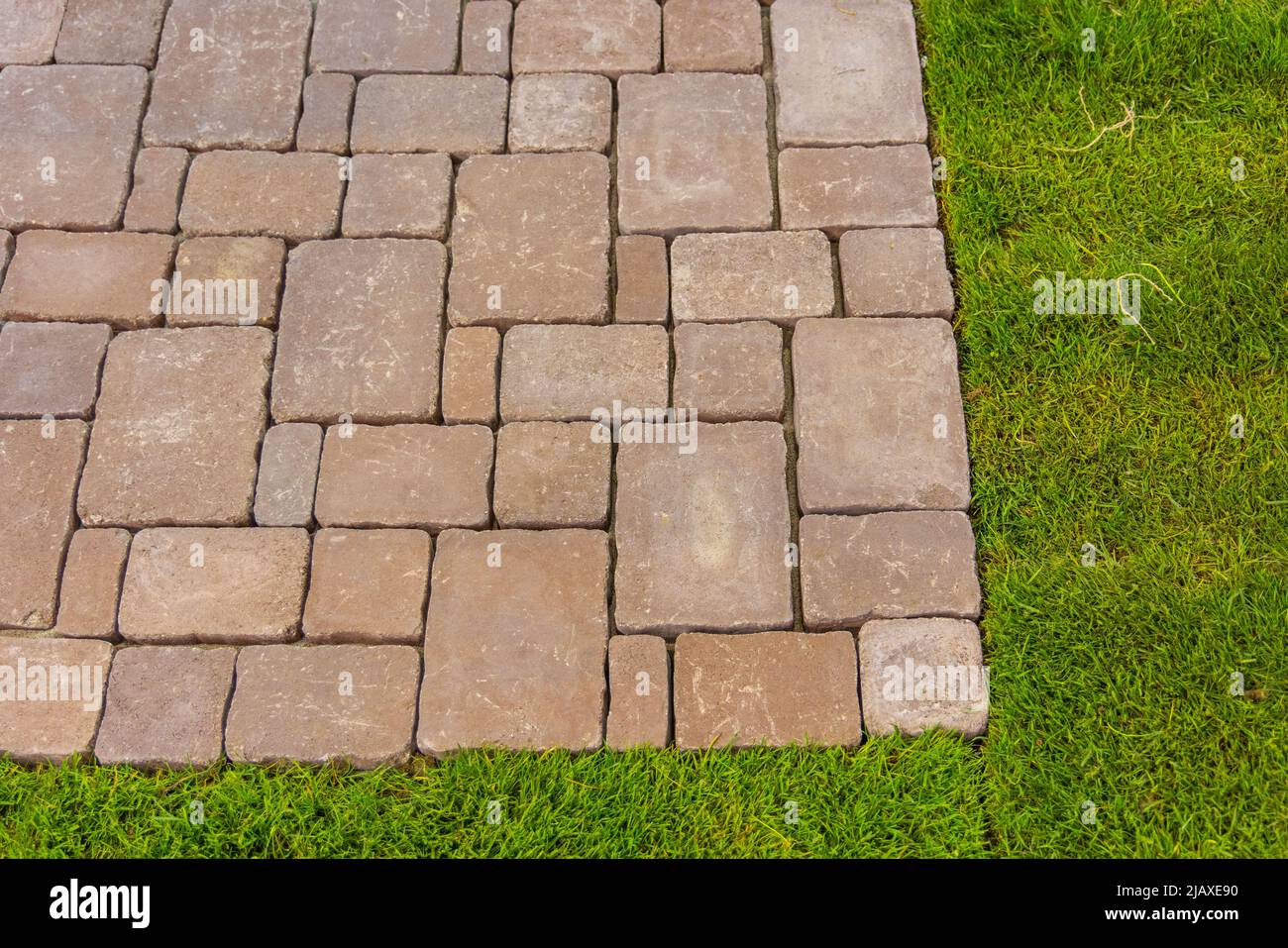 Irregular Edges Mix Size and Shape Patio Tiles for Garden Stock Photo ...
