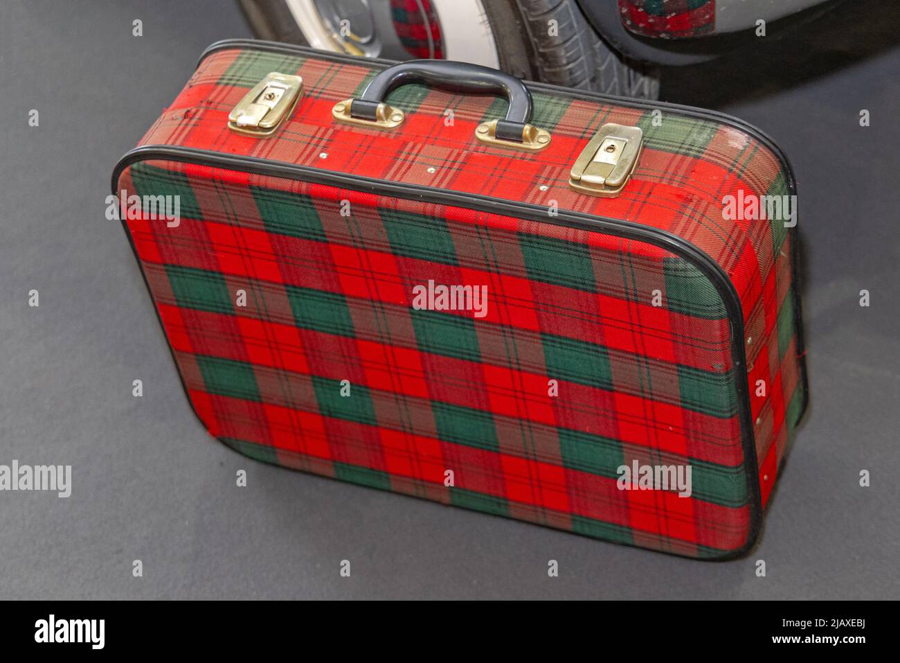 Big red suitcase hi-res stock photography and images - Alamy