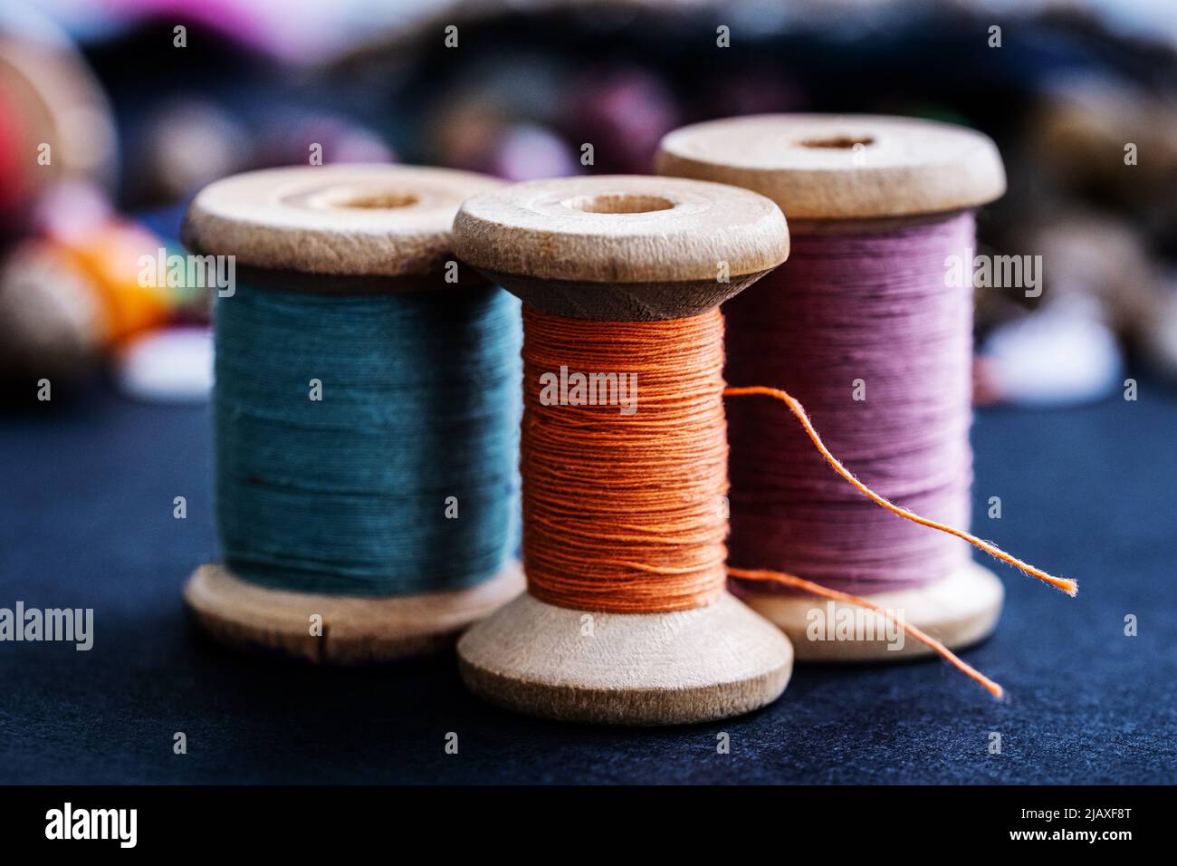 Retro threads on wooden bobbins Stock Photo - Alamy