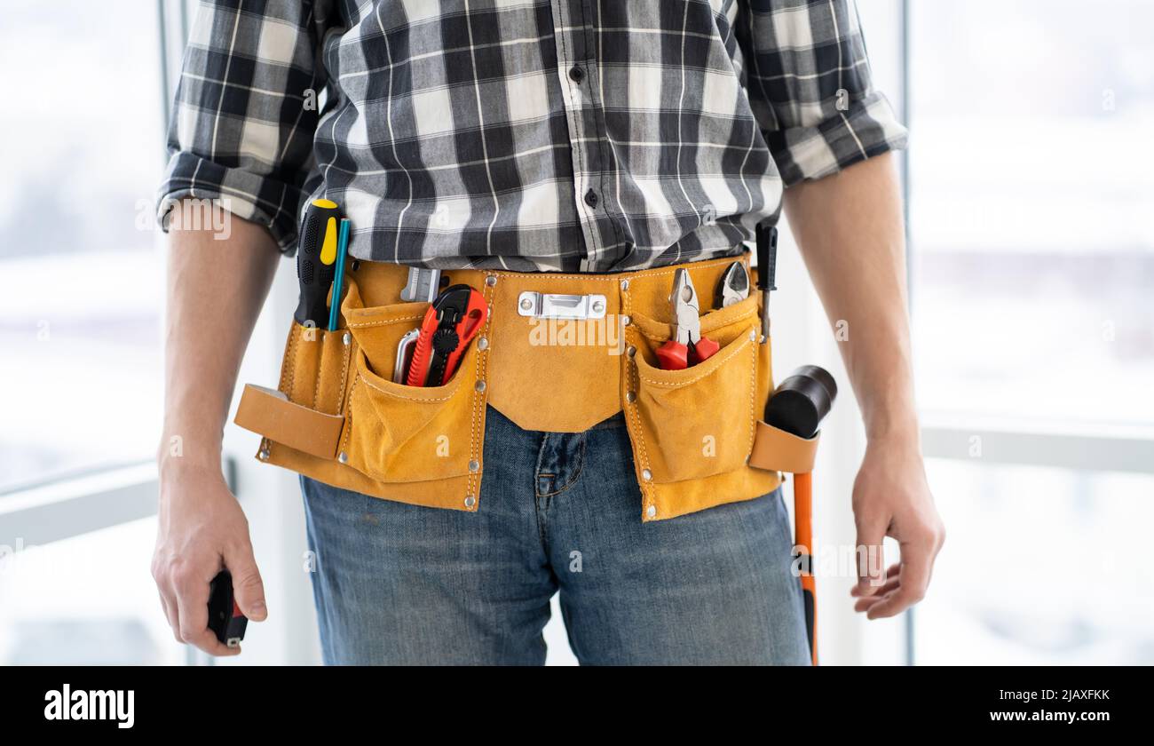 Mounting belt with tools for repair Stock Photo - Alamy