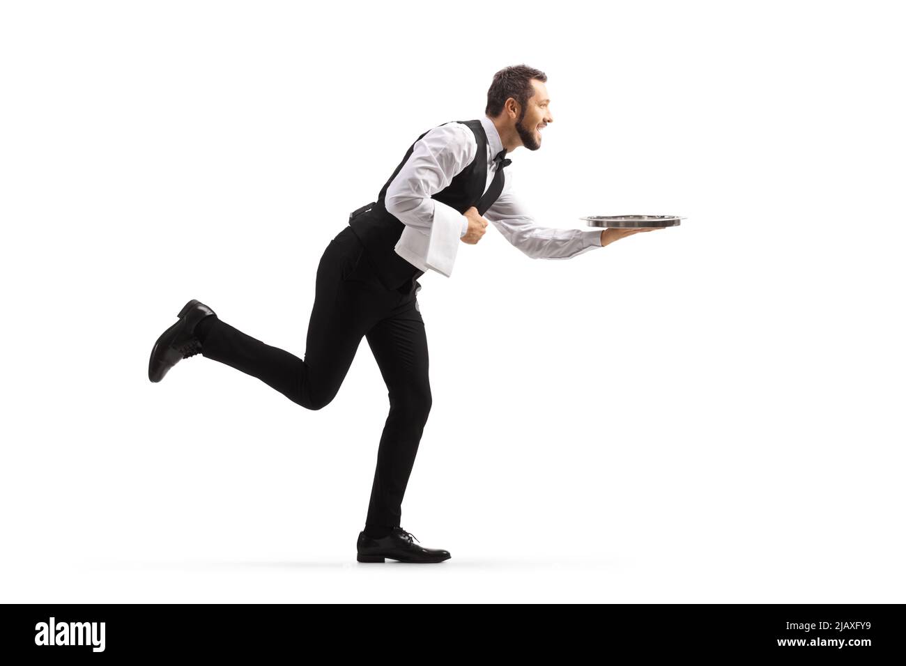 Full length profile shot of a waiter running with an empty tray ...