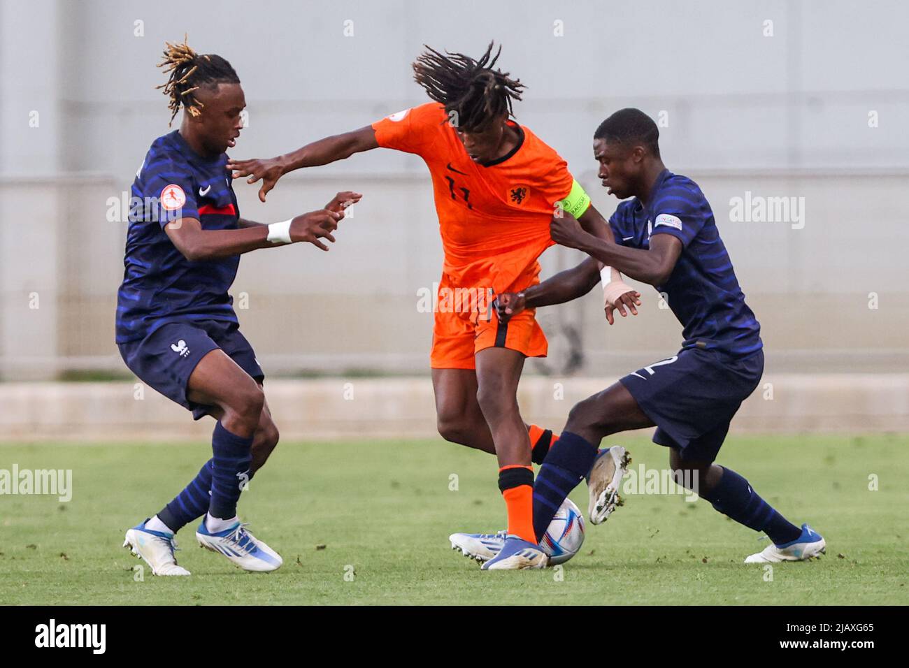 NETANYA, ISRAEL - JUNE 1: Isaac Babadi of the Netherlands U17 battles ...