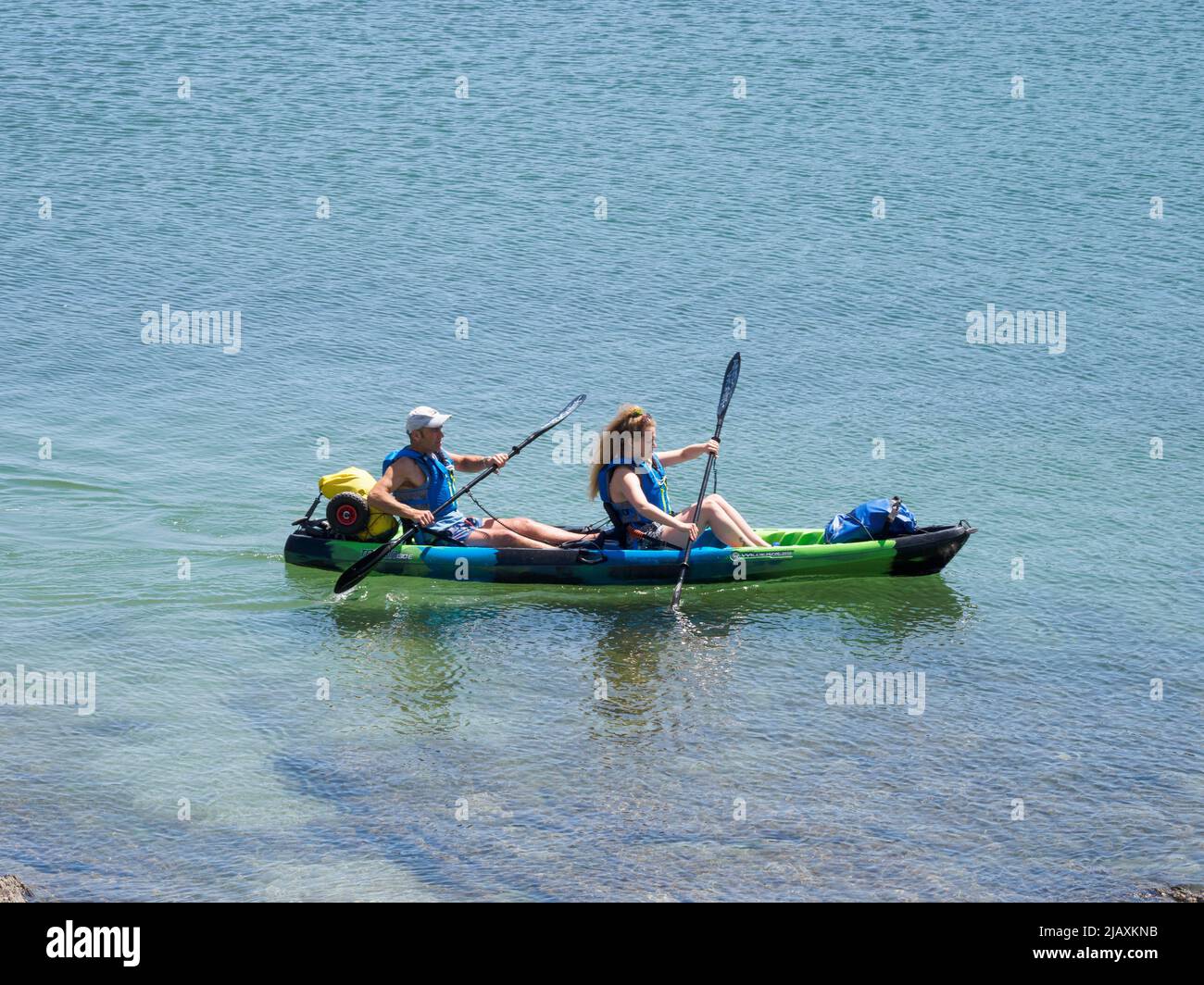 Couple kayaking along the Helford River, Cornwall, UK Stock Photo - Alamy