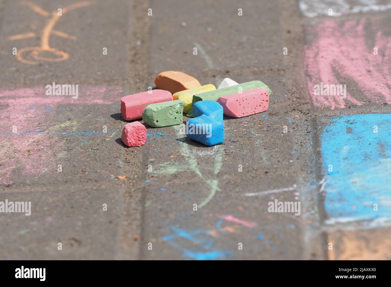 Colored crayons for asphalt. Draw with chalk on the pavement Stock ...