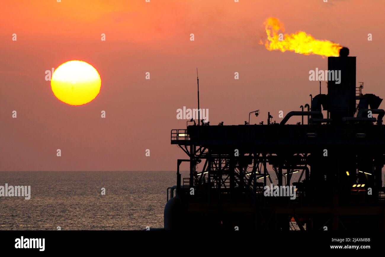 Gas flare and offshore oil platform in the South China Sea Stock Photo ...
