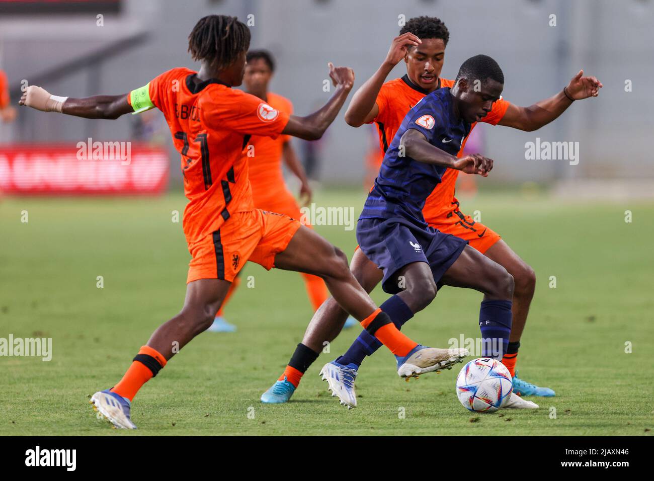 NETANYA, ISRAEL - JUNE 1: Sael Kumbedi of France U17 battles for the ...