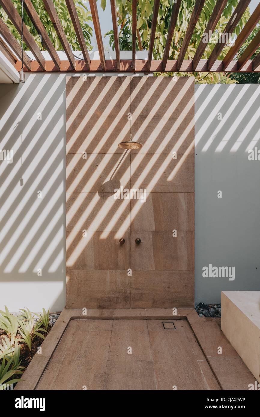 Patterned shadows in a shower Stock Photo - Alamy