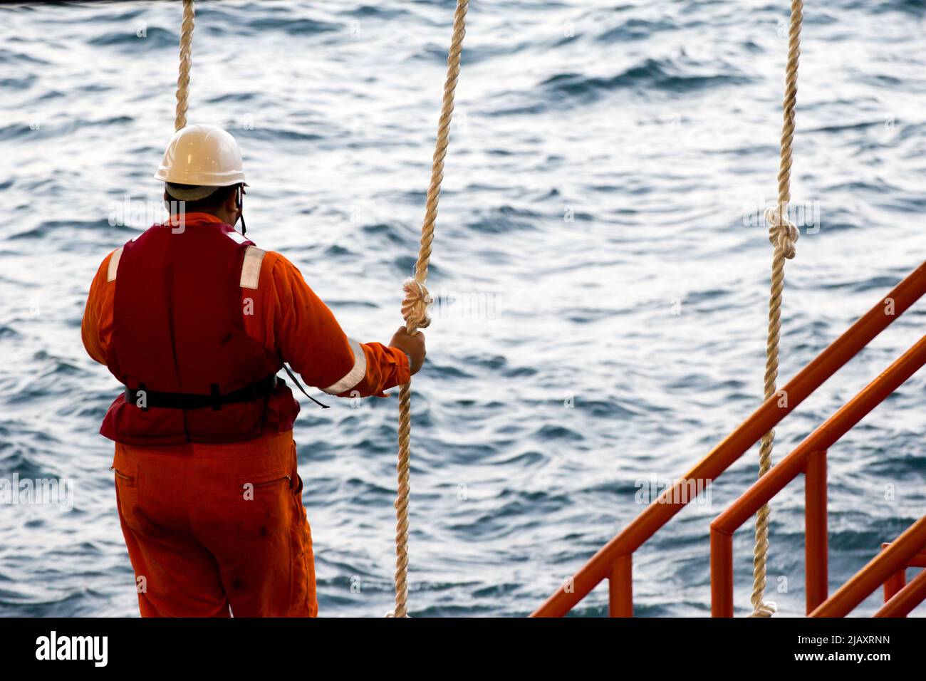 Rig workers are transported on a vessel to offshore rigs in The South ...