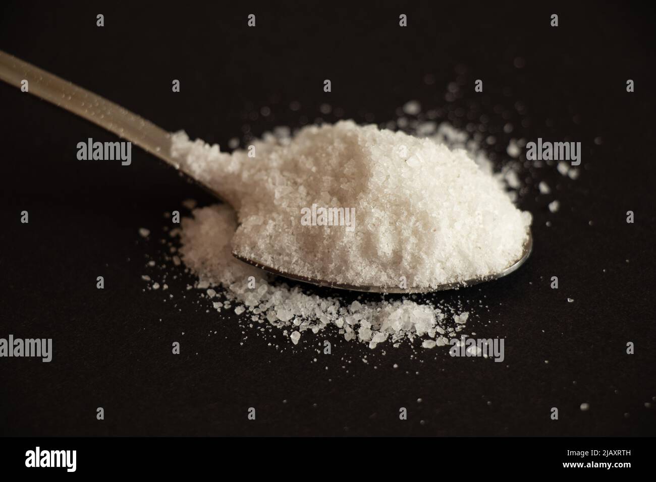 Teaspoon and rock salt, spices and seasonings, food salt, spoon of salt ...