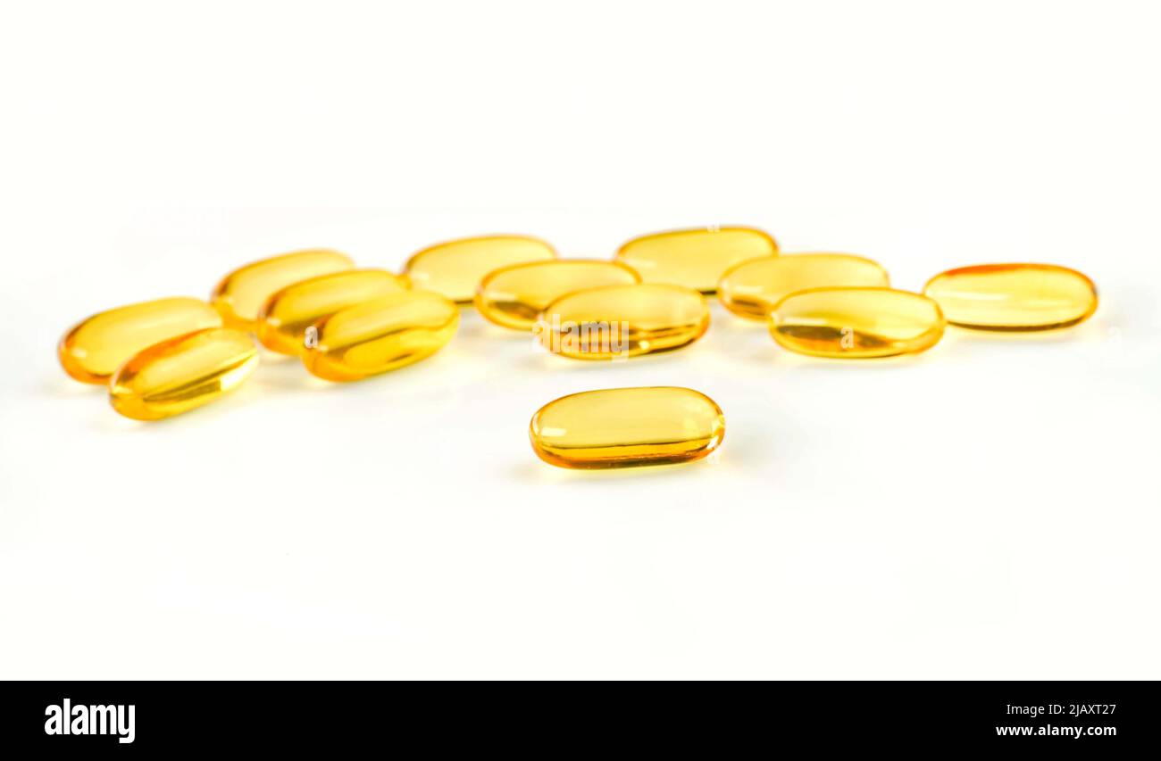 Omega 3. Oily fish, in capsules, on a white background. Omega3. Healthy ...