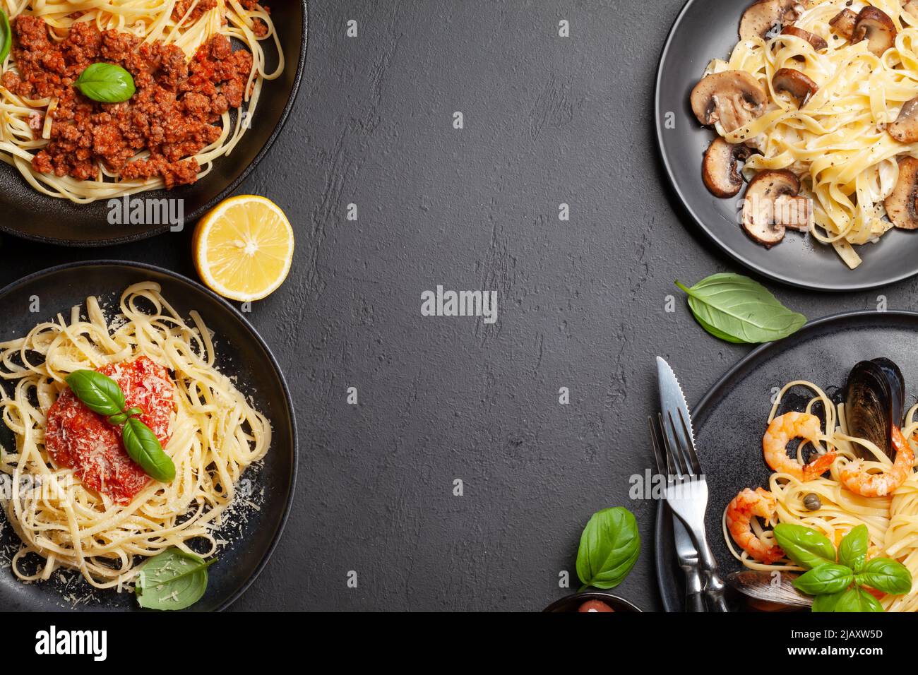 Various Italian pasta. Seafood, mushroom and tomato sauce pasta ...