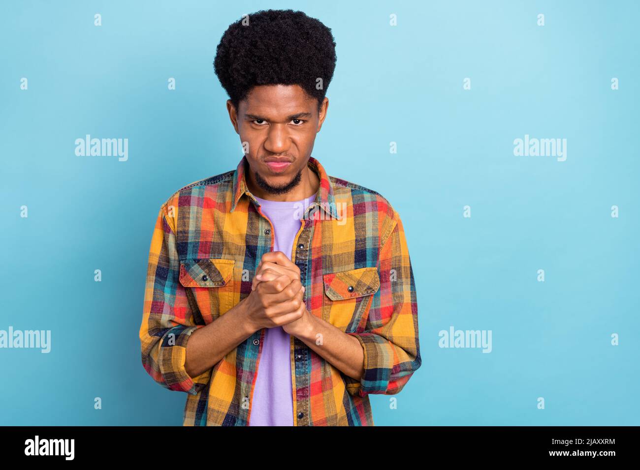 Photo of confident sly dark skin guy dressed checkered hands together ...