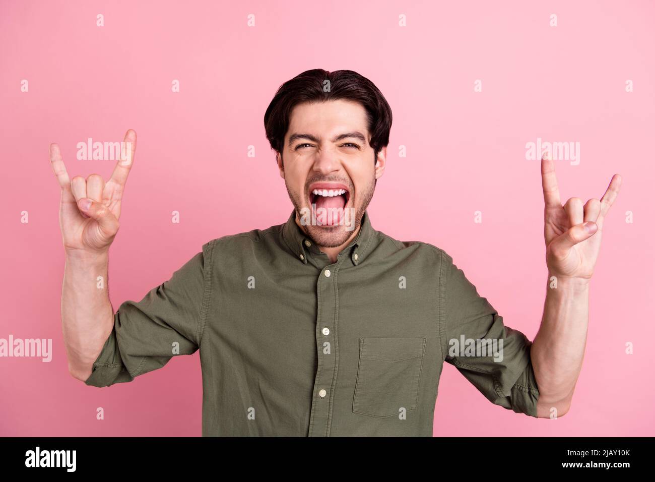 Photo of funky harsh rude fan guy show two horns symbols yell wear ...