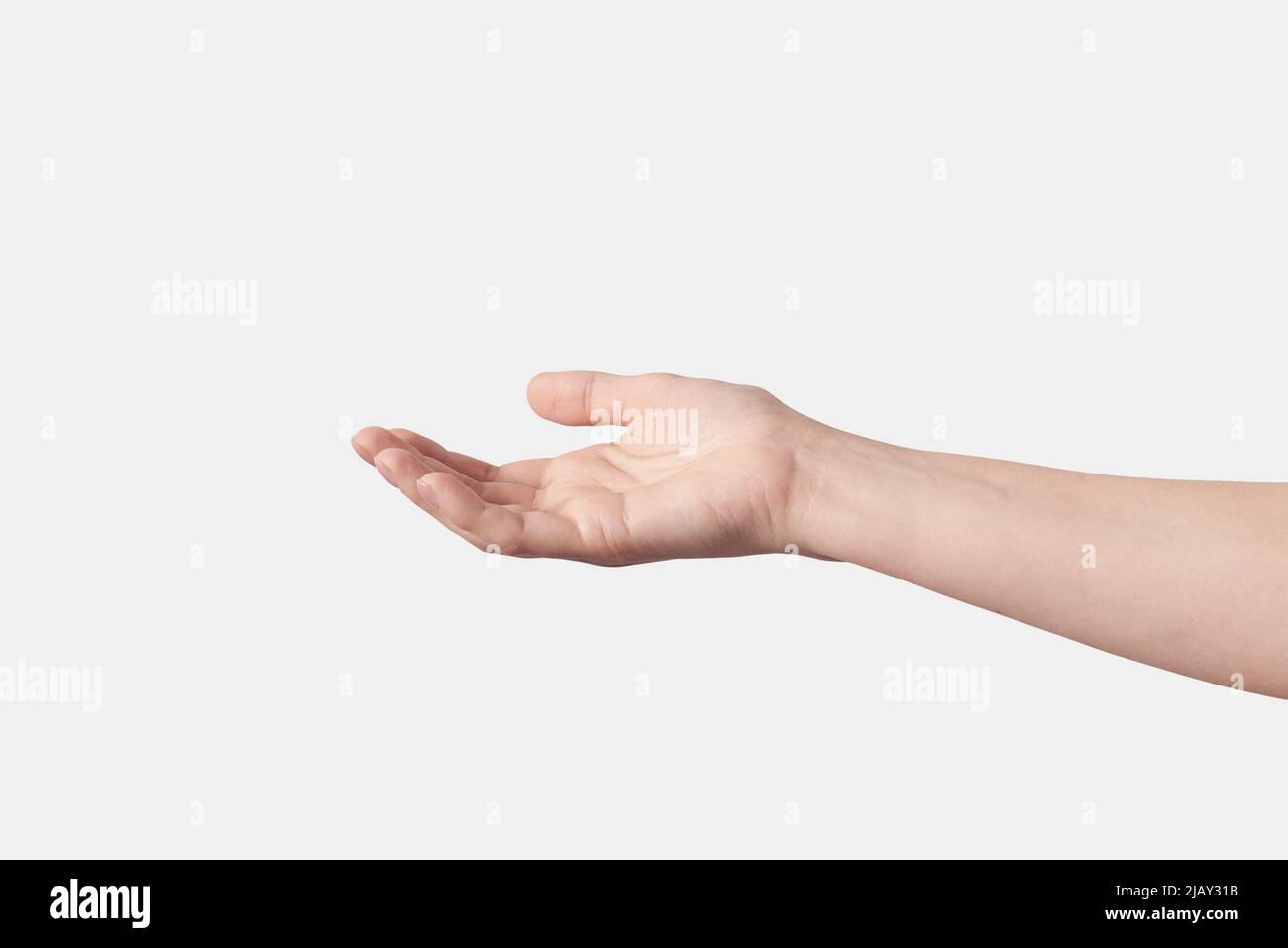 Reaching out female hand show gesture isolated white Stock Photo - Alamy