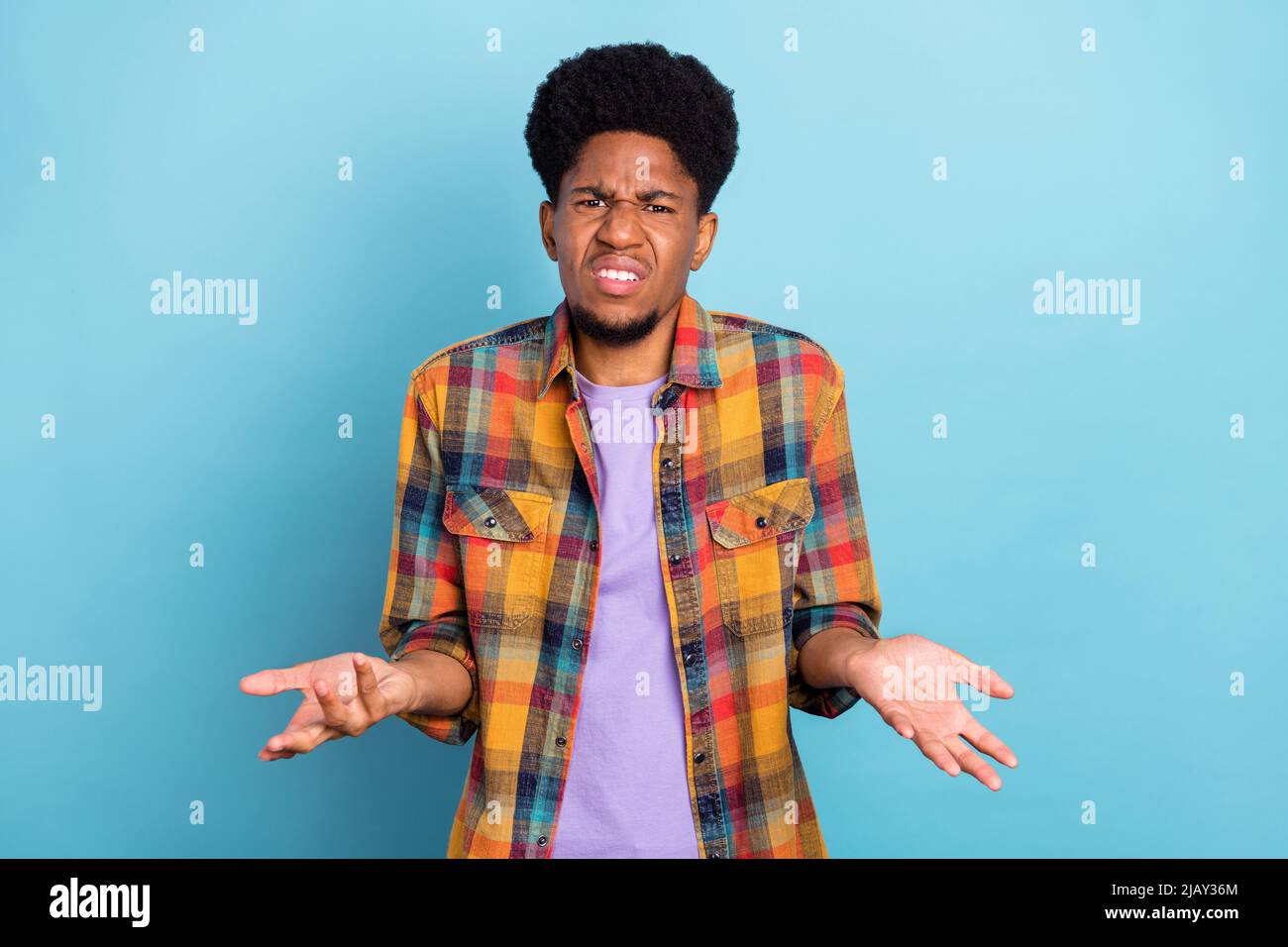 Photo of angry annoyed dark skin man wear plaid shirt asking understand ...