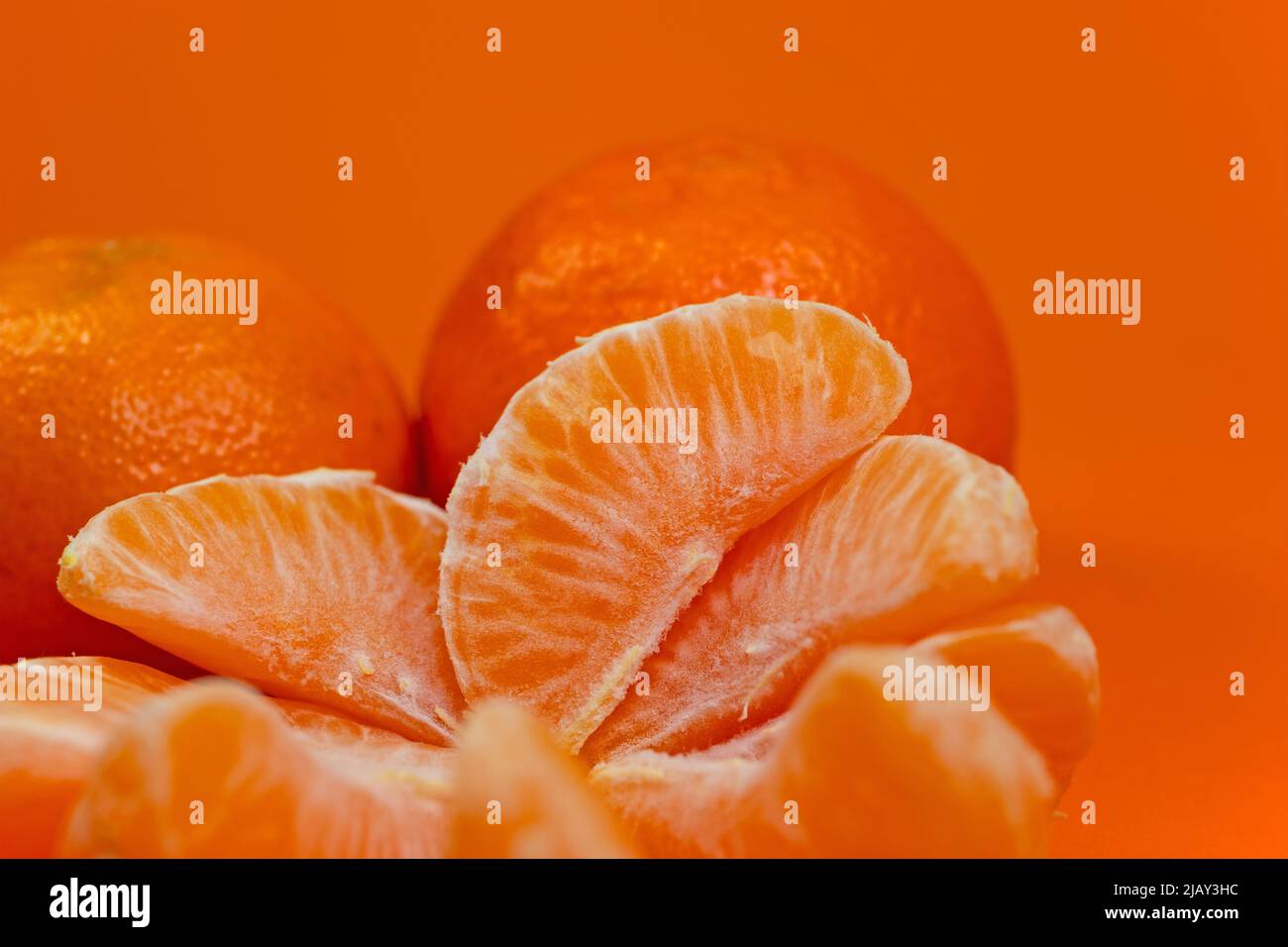 Mandarin segments in a close-up Stock Photo - Alamy