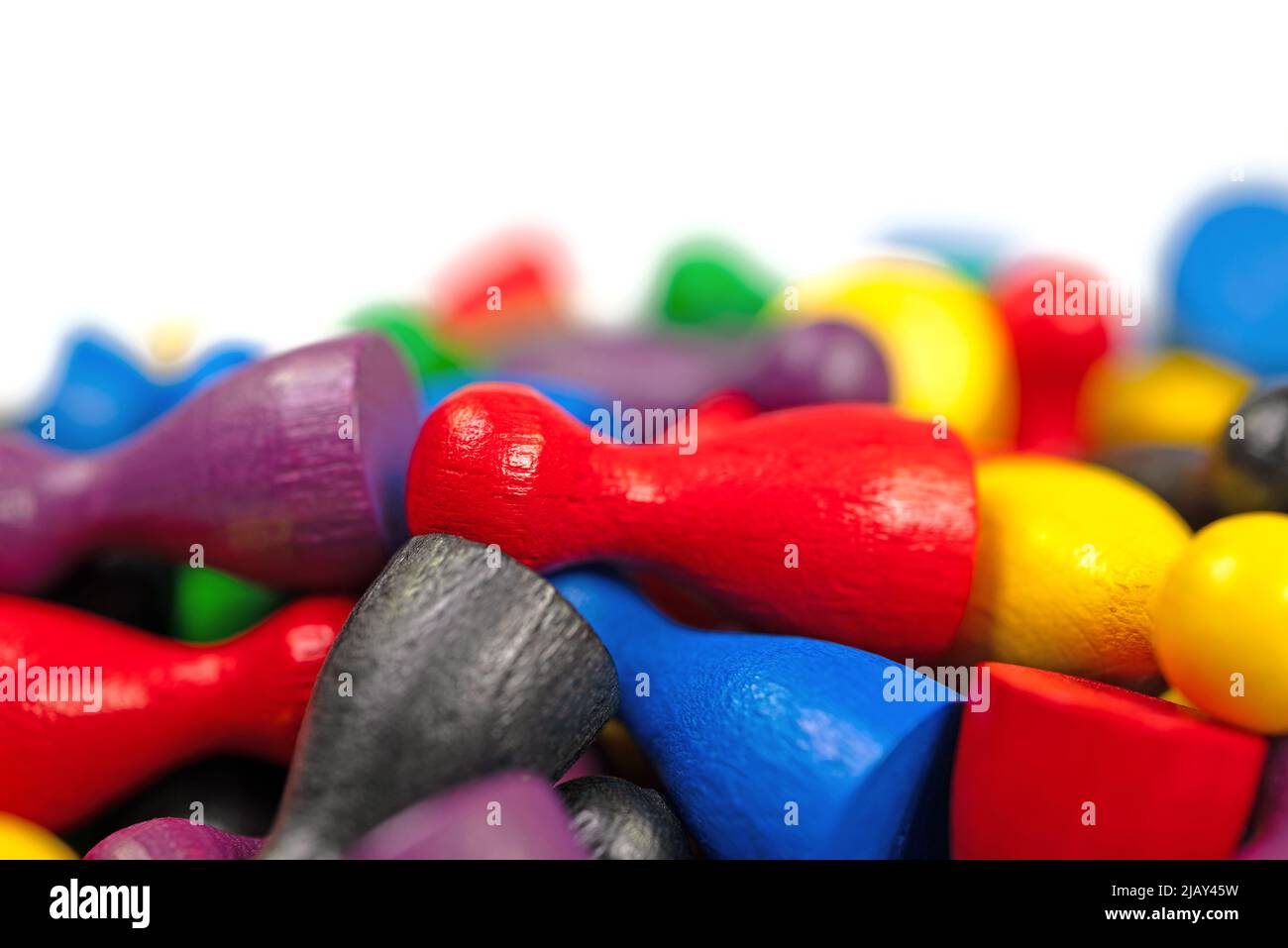 Lots of colorful game pieces for board games Stock Photo - Alamy