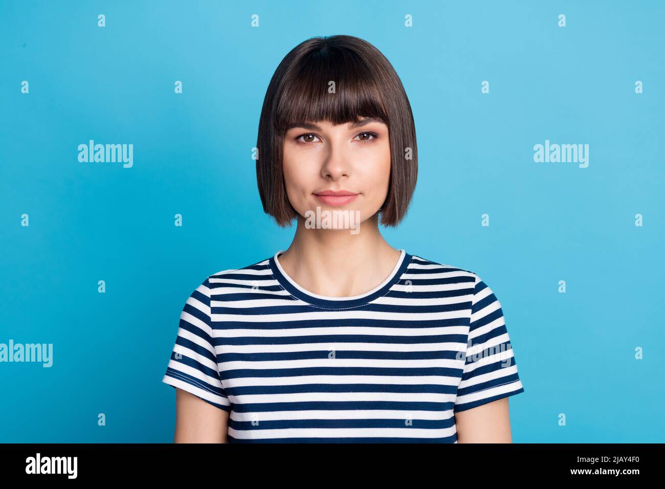 Photo of young serious calm woman wear striped t-shirt charming casual ...