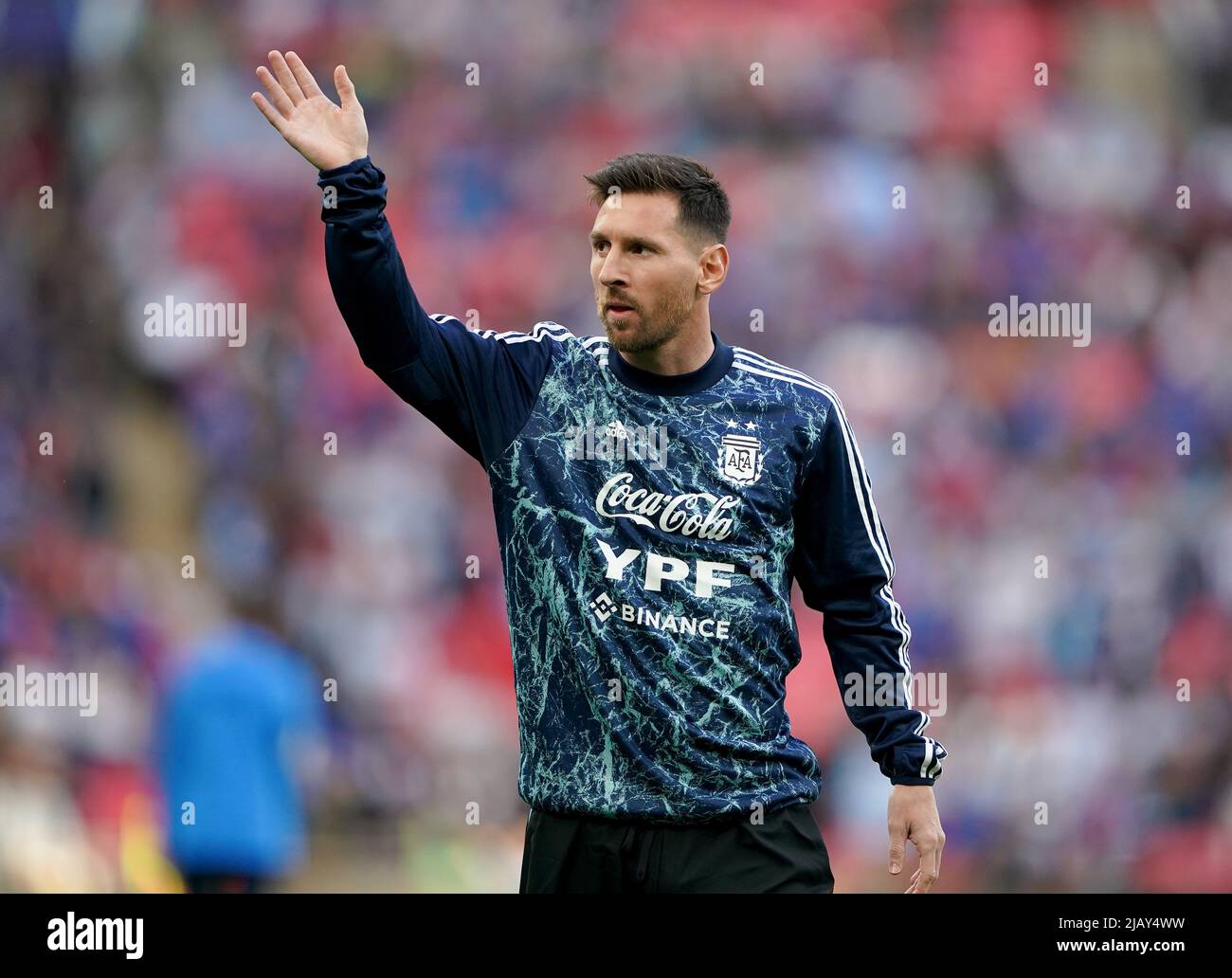 Argentina’s Lionel Messi acknowledges the fans during warm up ahead of ...