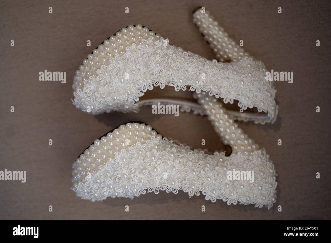 white wedding shoes for bride Stock Photo - Alamy