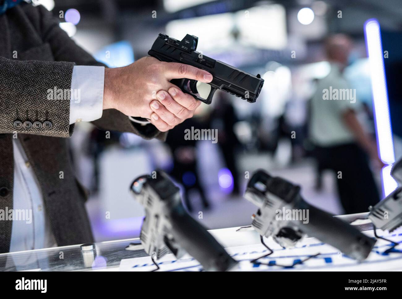 Ottawa, Can. 01st June, 2022. An attendee holds a Walther PDP pistol at ...