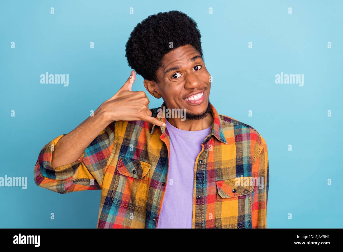 Photo of cute millennial brunet guy call me wear checkered shirt ...