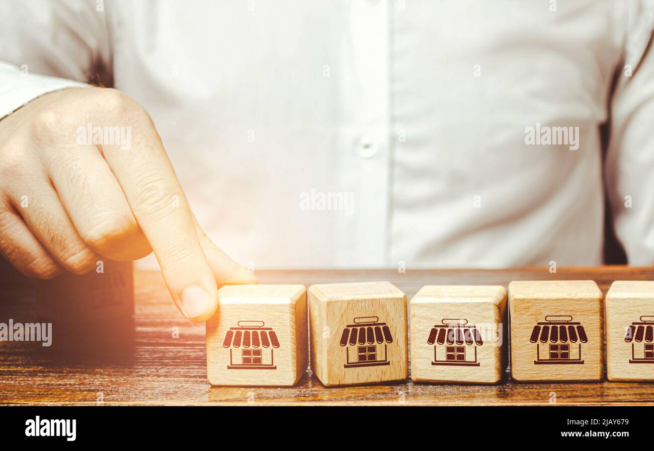 Businessmen opening of a new store. Adding a outlet. Franchise ...