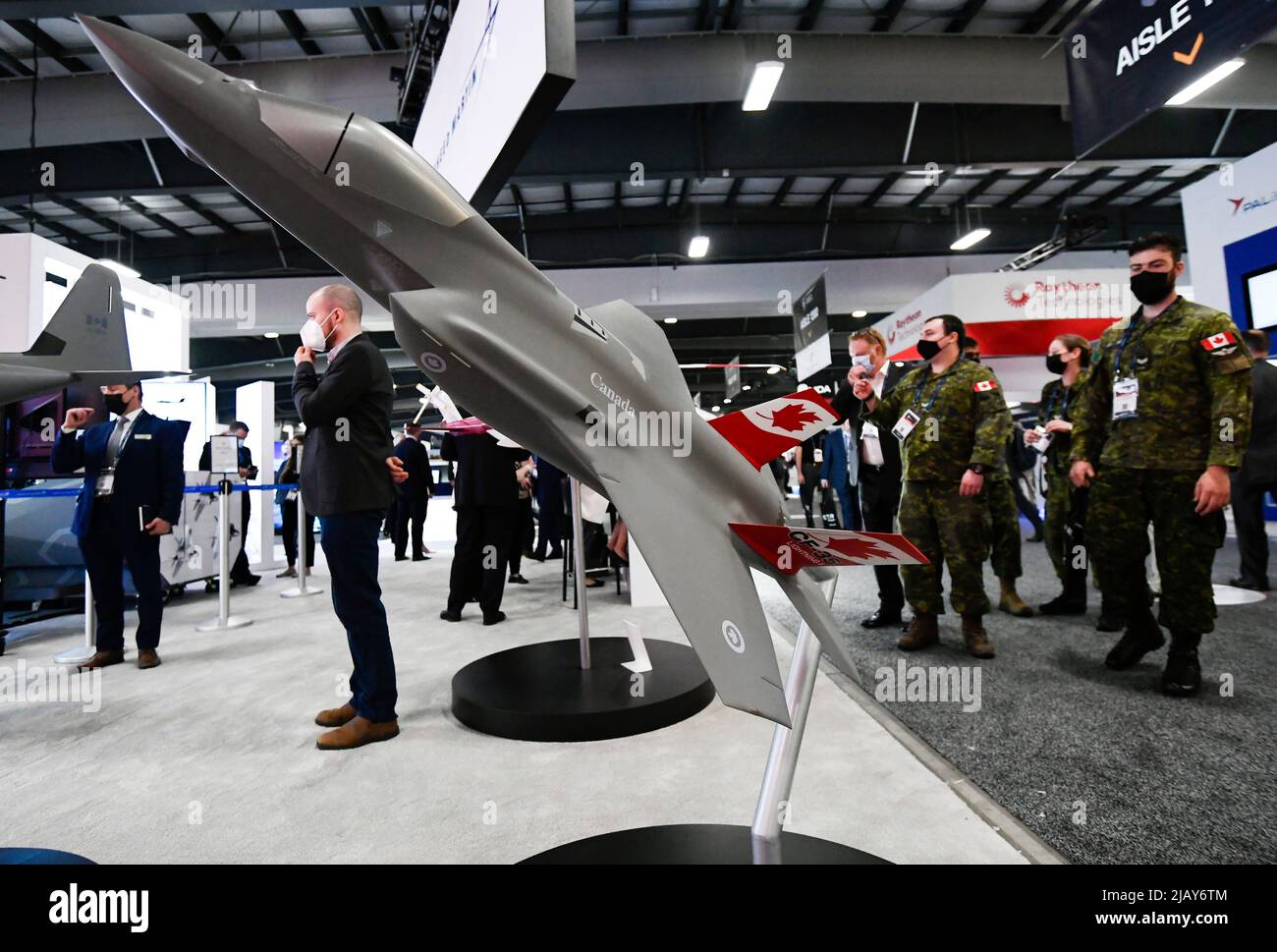Ottawa, Can. 01st June, 2022. People pass a model of Lockheed Martin ...