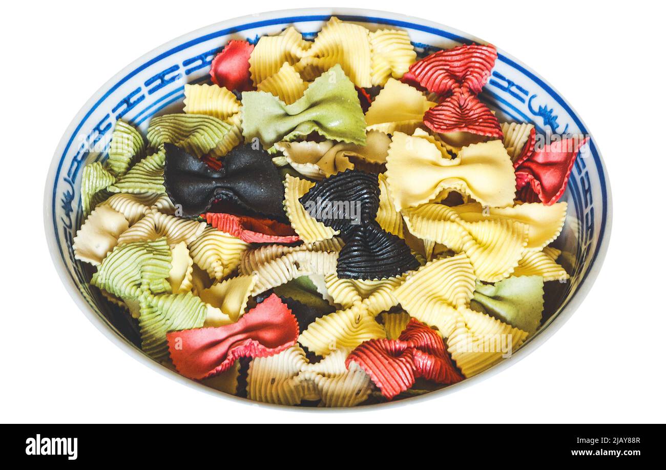 colorful fancy pasta in china bowl, isolated Stock Photo - Alamy