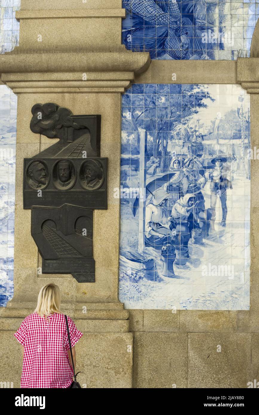 Decorative ceramic tiles azulejos surround the interior of the entrance ...