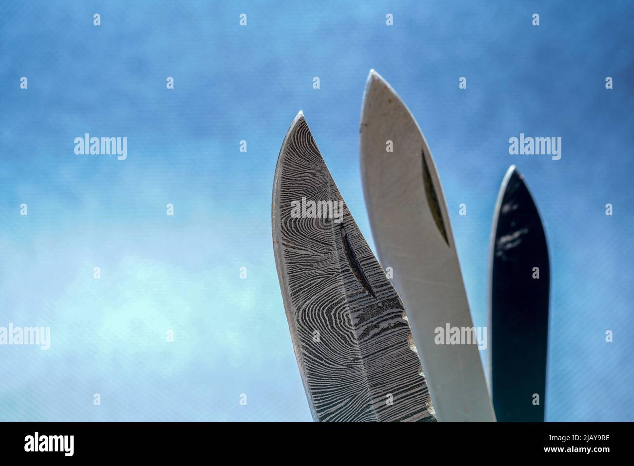 Hand-forged knife made of several layers of steel with an exclusive ...