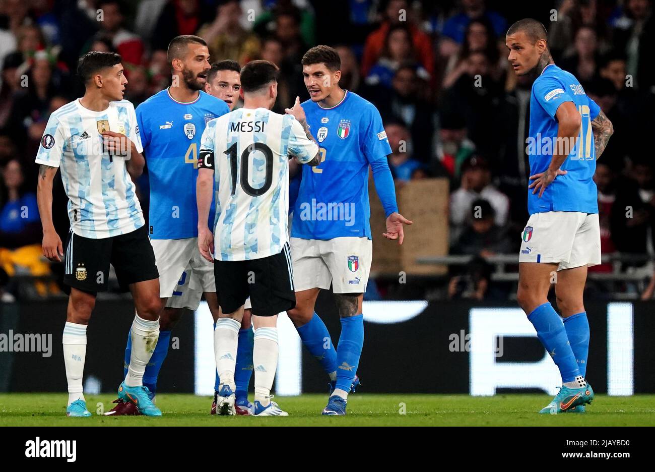 Argentina's Lionel Messi (centre) gestures towards Italy's Giovanni Di ...