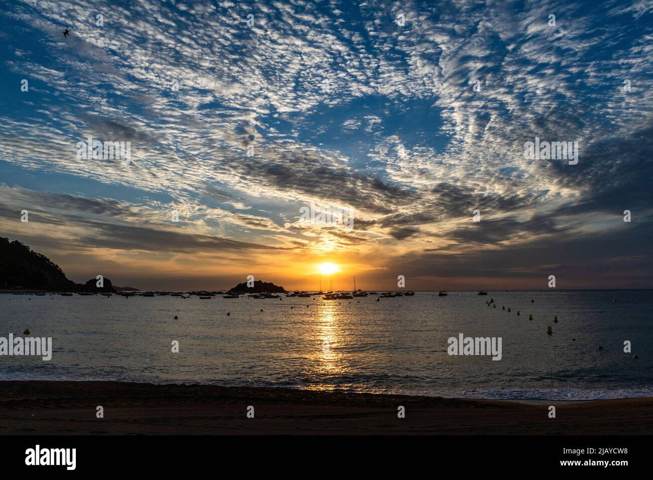 Sunrise on the bay of Tossa de mar, Spain, rising of the sun on the ...