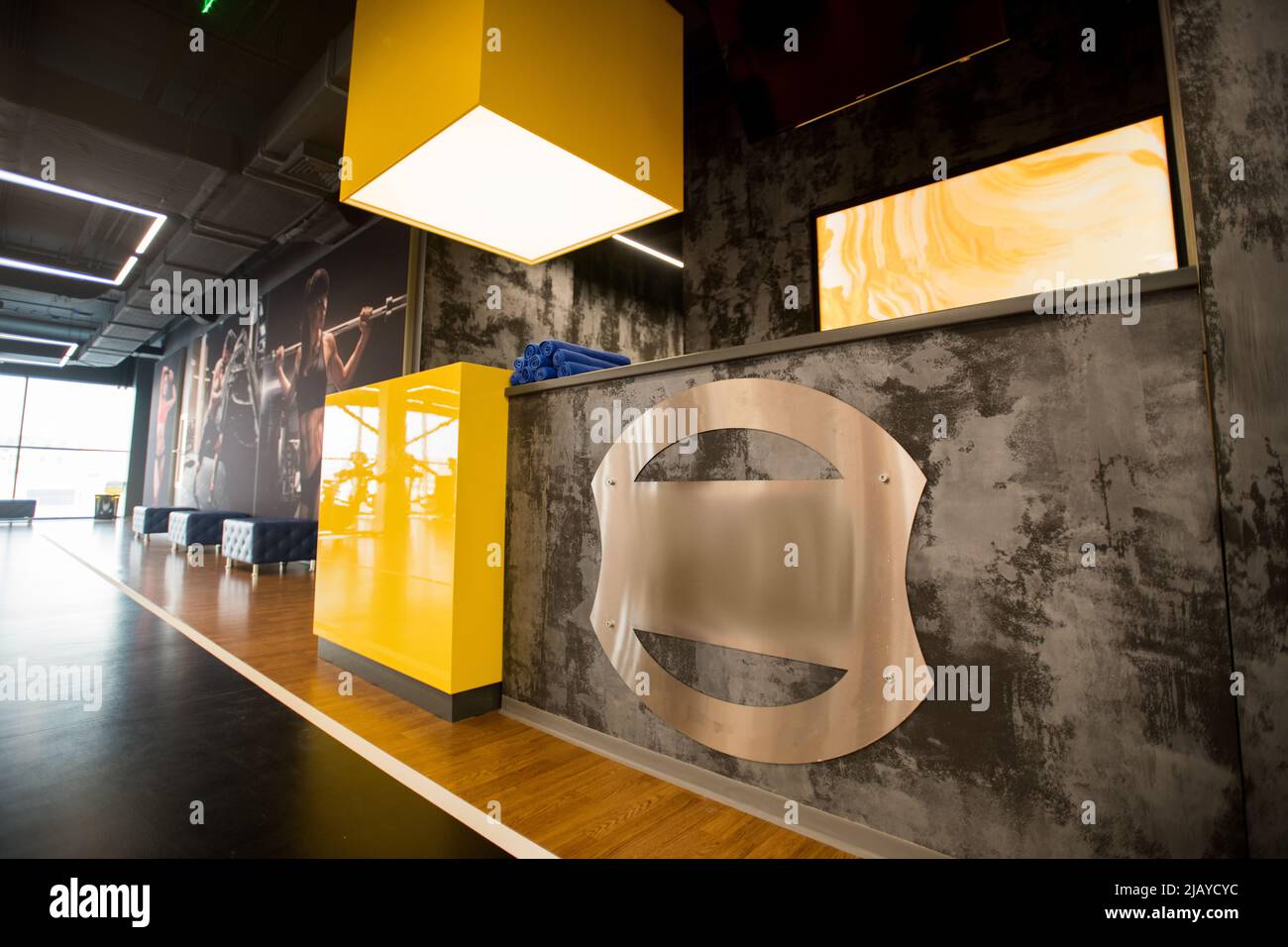 Image of stylish reception place with beautiful yellow lamp in a modern ...