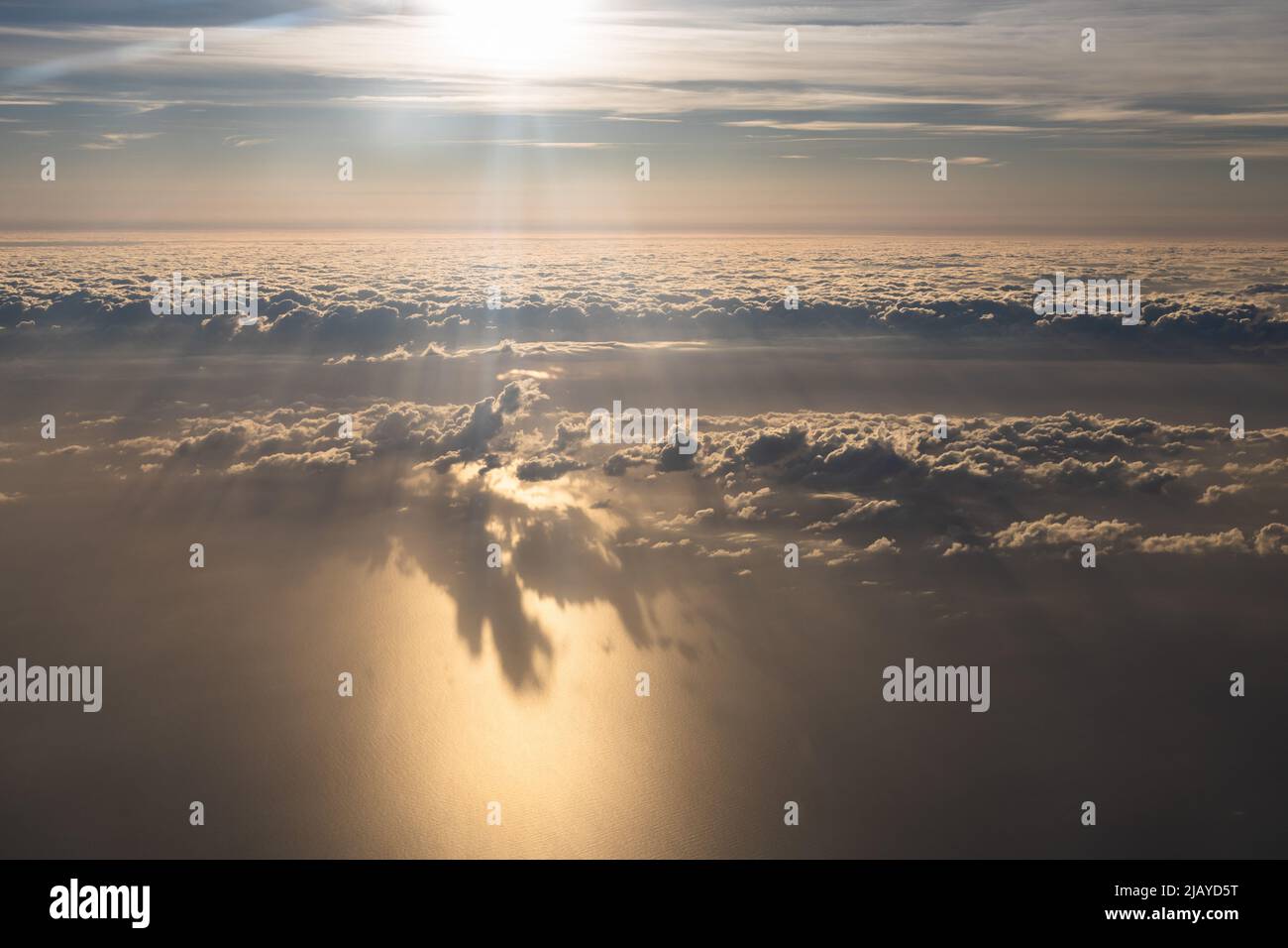 Aerial view of magic clouds during sunrise, shadow of clouds on the sea ...