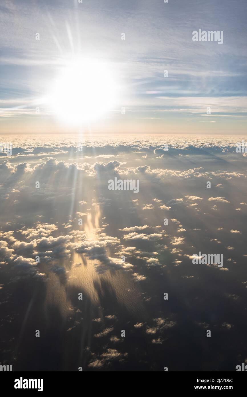 Aerial view of magic clouds during sunrise, shadow of clouds on the sea ...