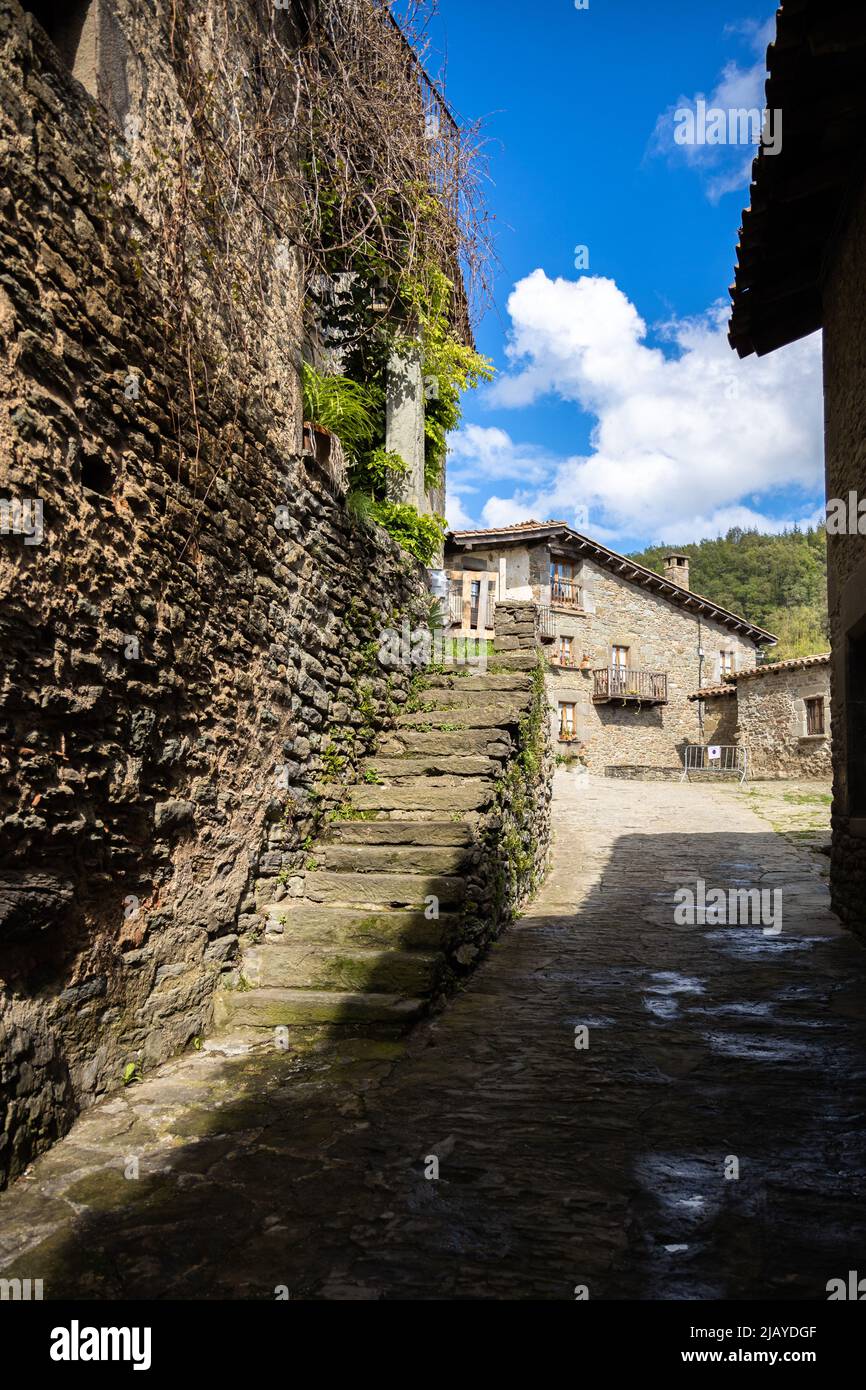 Empty street of medieval spanish village Rupit, old stone street in ...