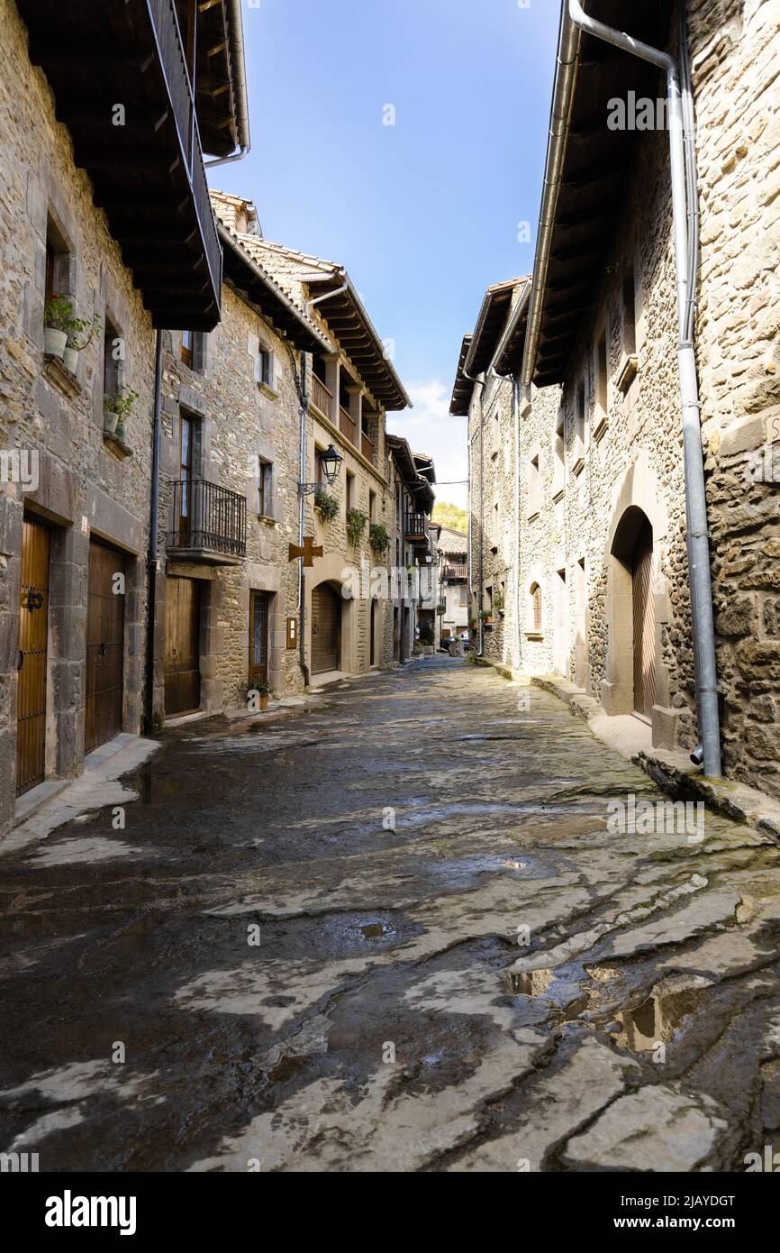 Empty street of medieval spanish village Rupit, old stone street in ...