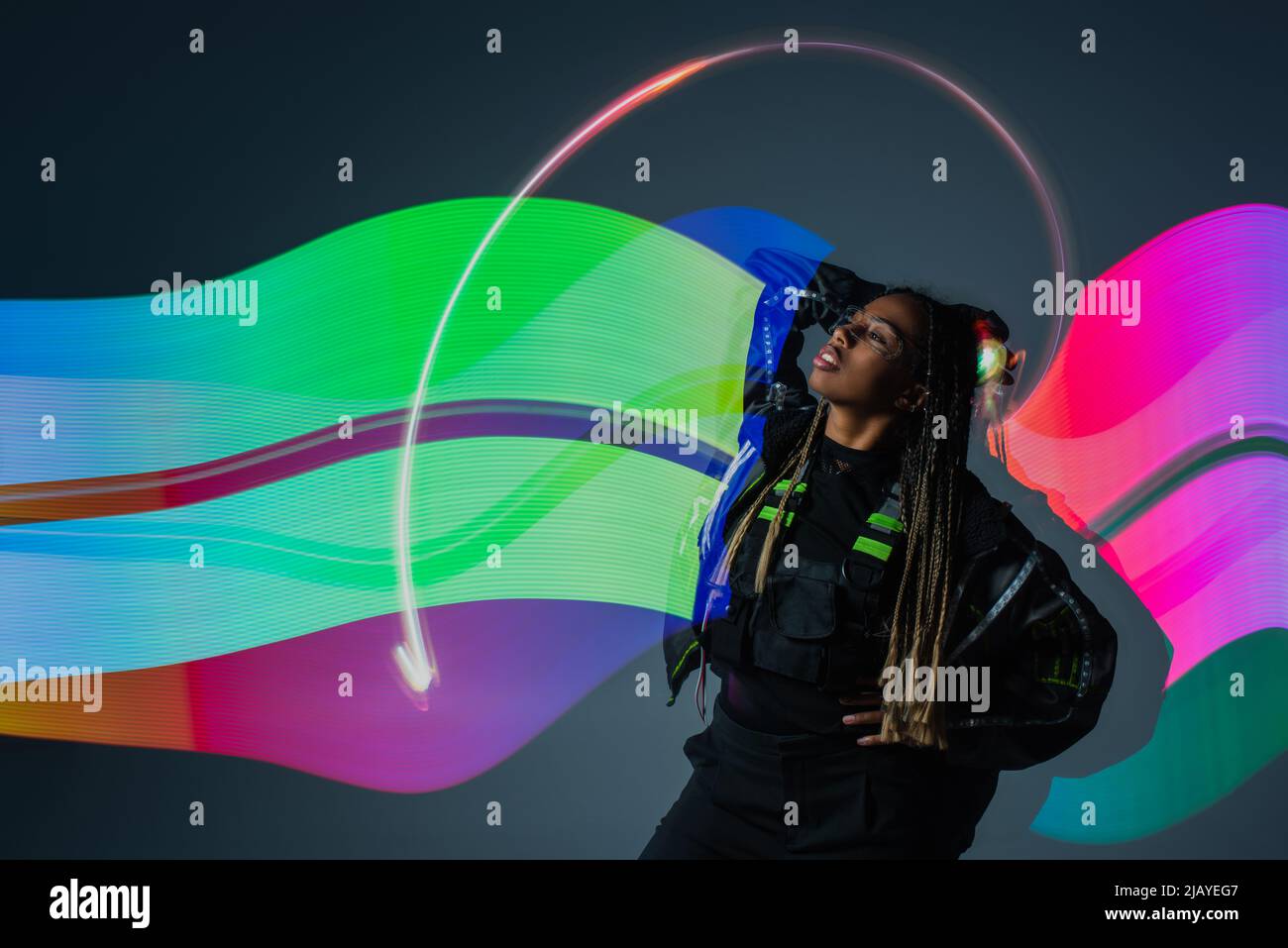 Long espouse of african american woman in smart glasses posing near ...