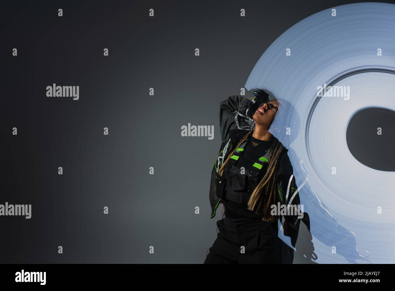 Multiple espouse of african american woman posing near abstraction on ...