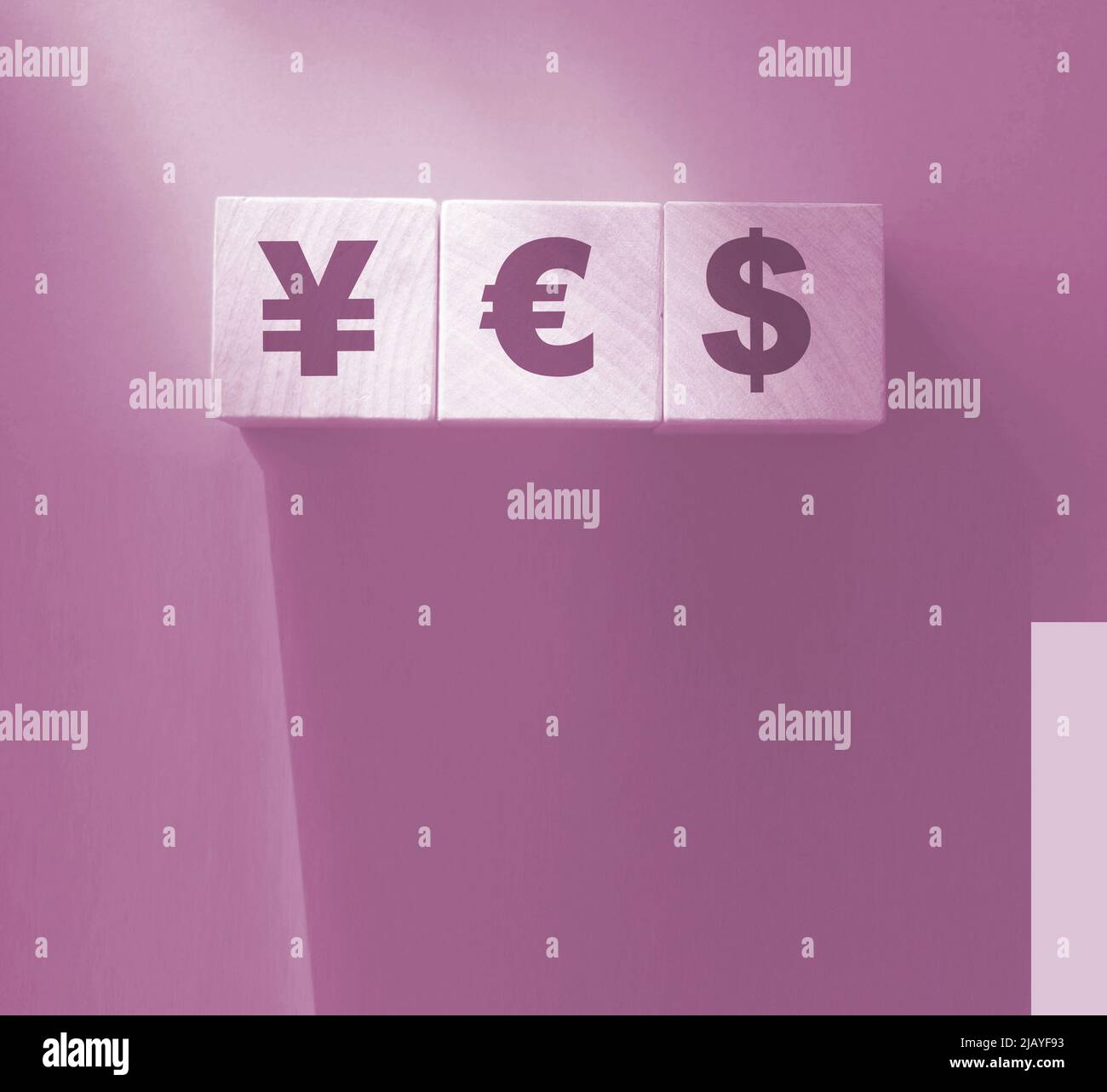 World currencies symbols - yen, euro and dollar printed on wooden cubes ...
