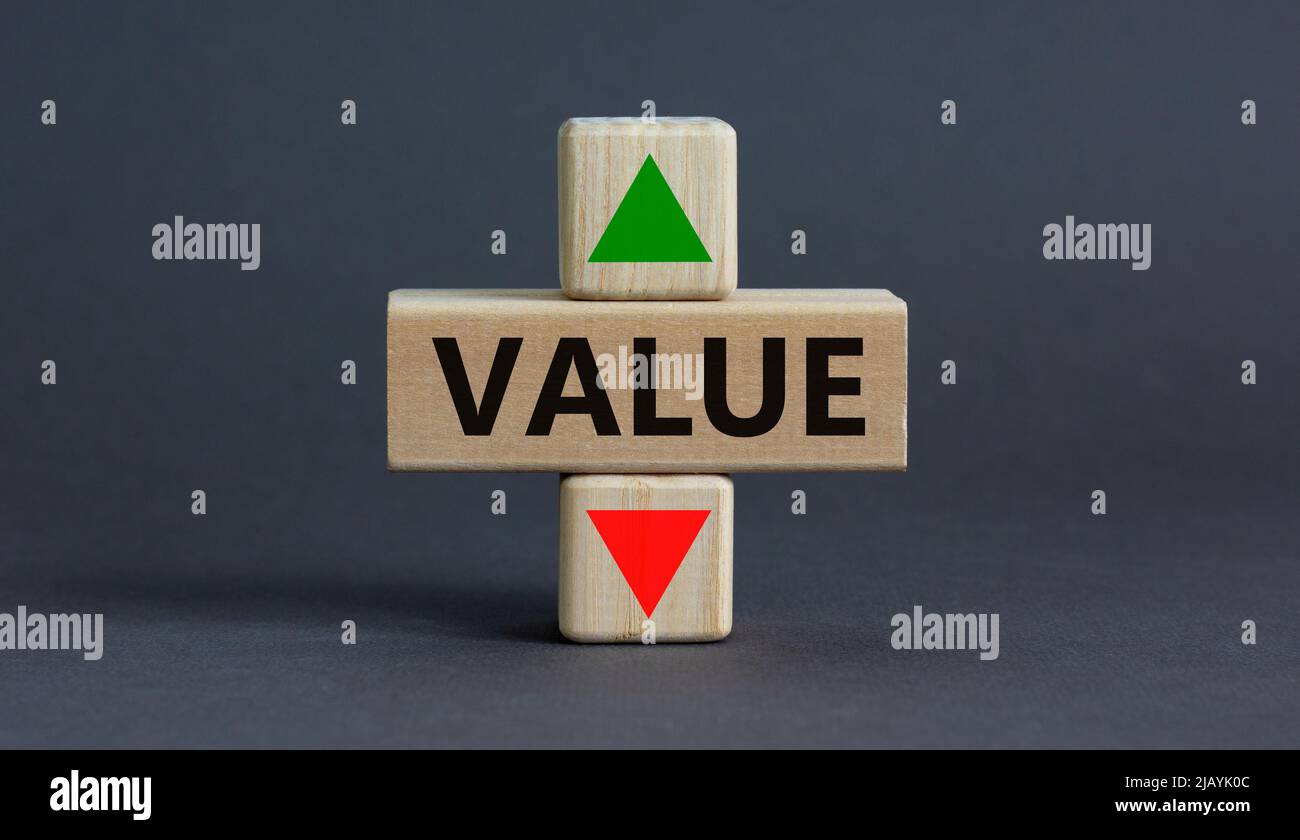 Value level symbol. A wooden cube with up icon. Wooden block with the ...