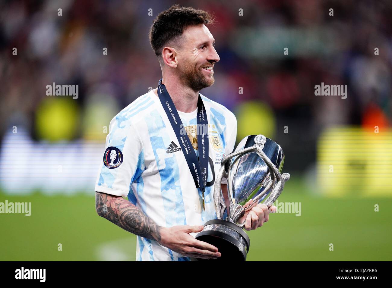 Argentina’s Lionel Messi with the Finalissima 2022 trophy after the ...