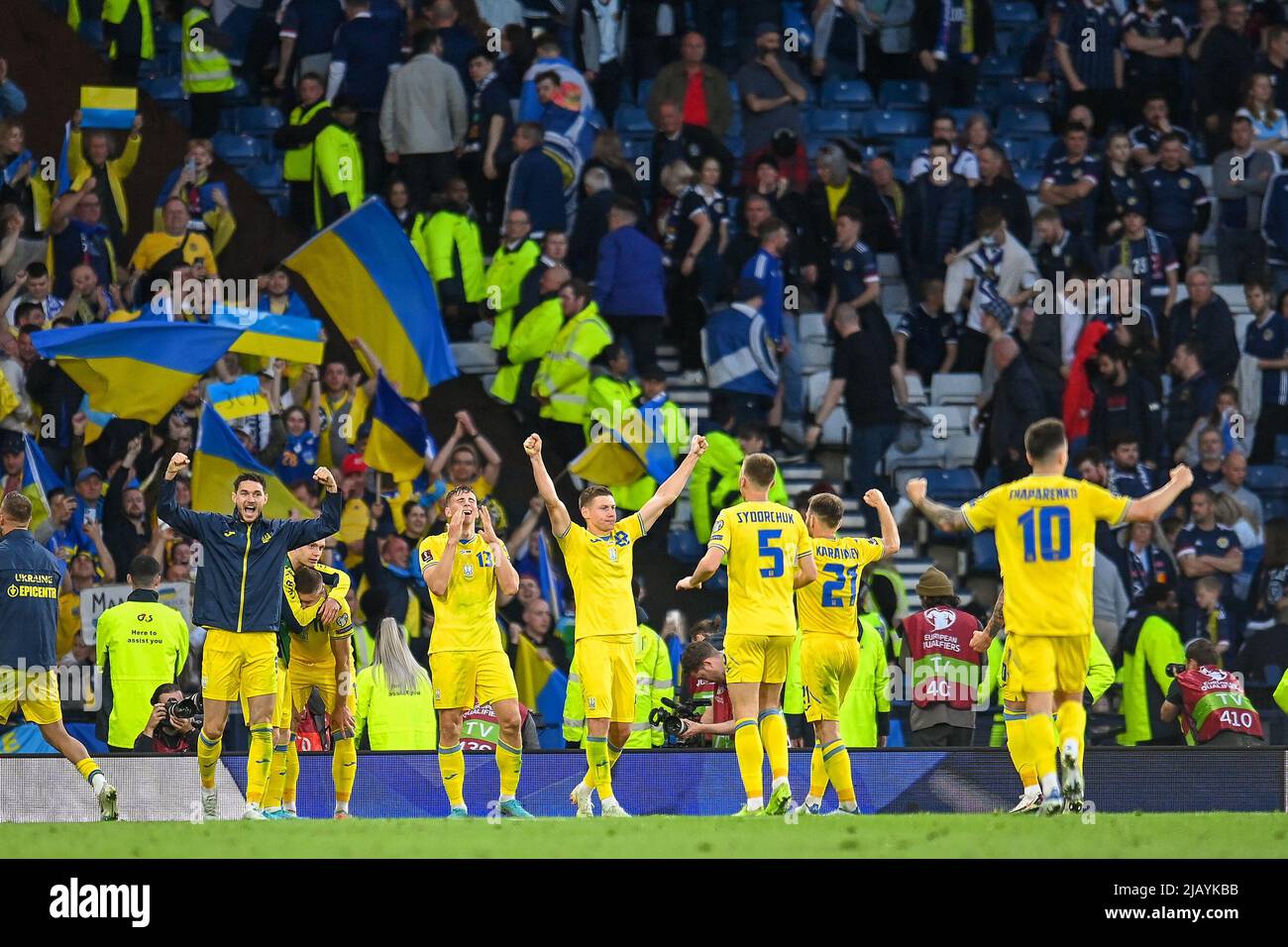 The Ukrainian team celebrate at the final whistle of the FIFA World Cup ...