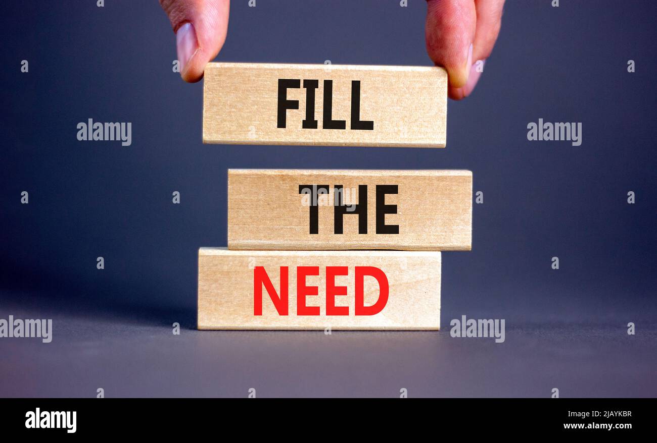 Fill the need symbol. Concept words Fill the need on wooden blocks on a ...