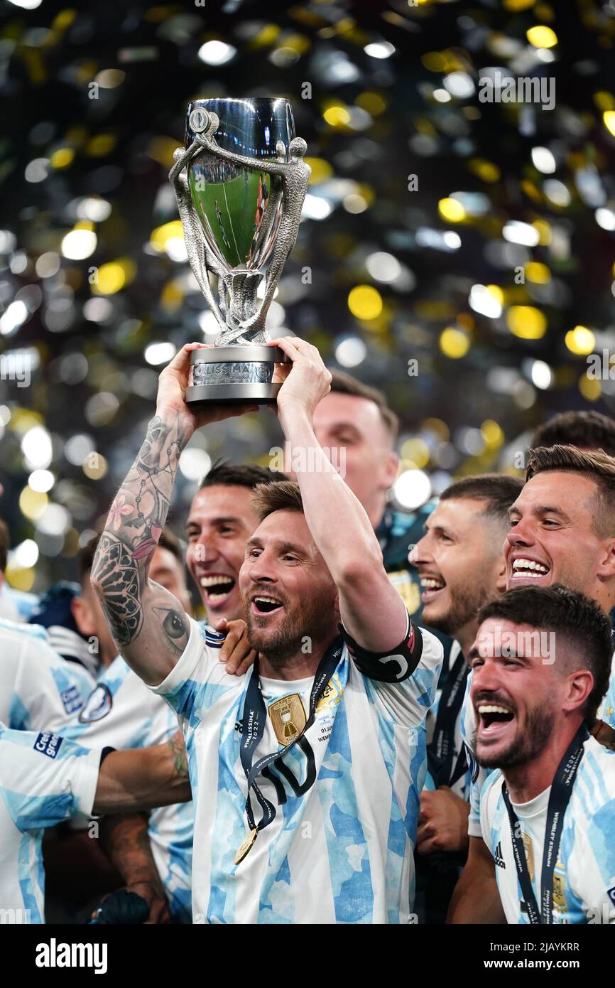 Argentina's Lionel Messi lifts the trophy after the Finalissima 2022 ...