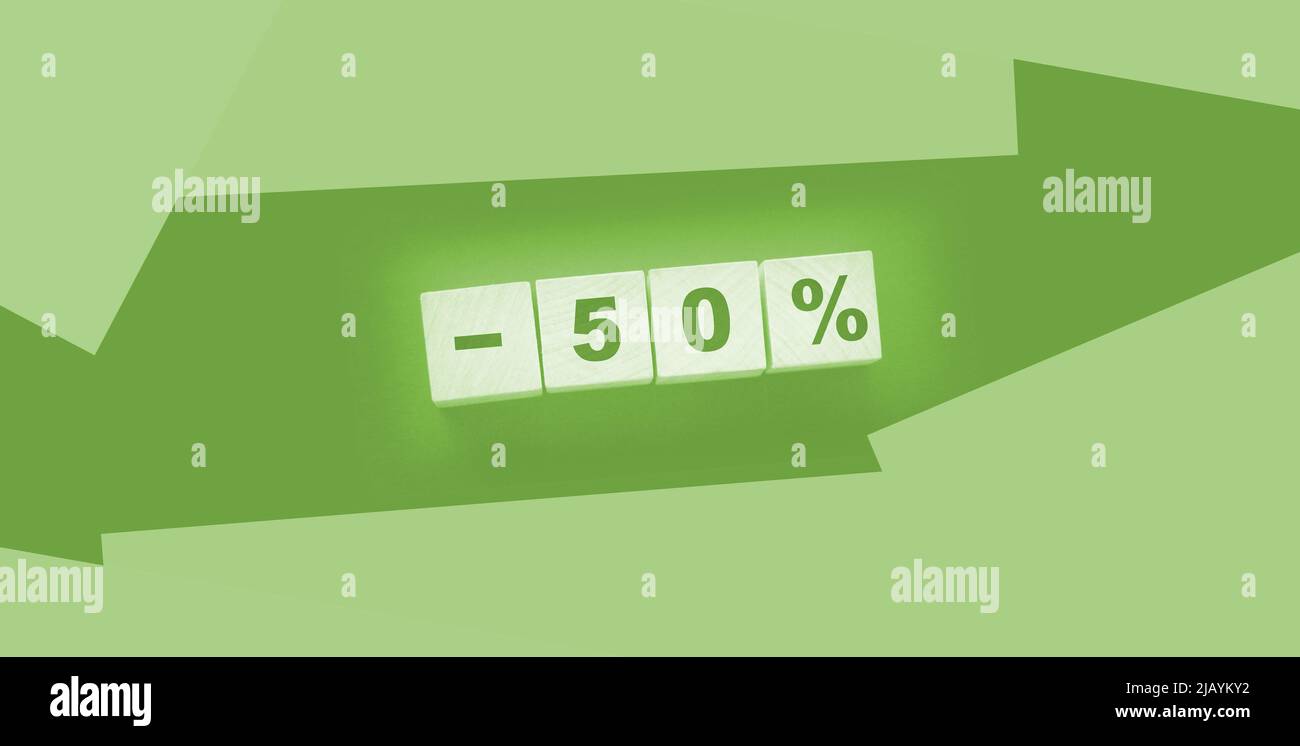 Minus 50% phrase on wooden blocks on black background. Sale business ...