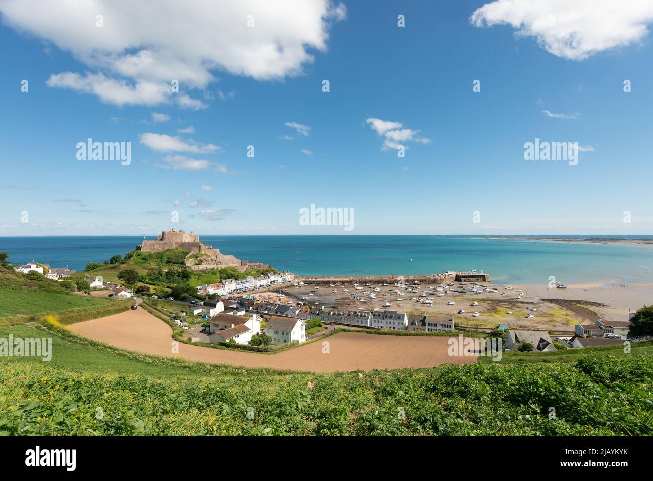 Mont Orgueil Castle (Gorey Castle), village and harbour Stock Photo - Alamy