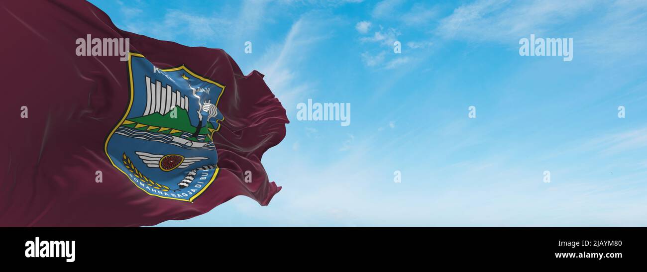 official flag of Banjar City Indonesia at cloudy sky background on ...