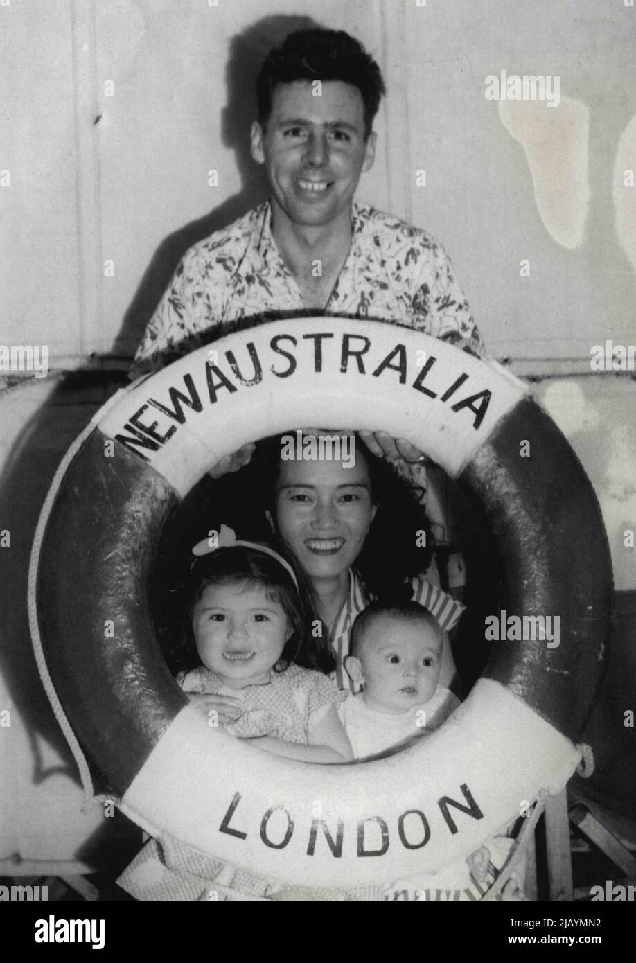 Sgt. James Perkins holds a life belt over his Jap wife and two children ...